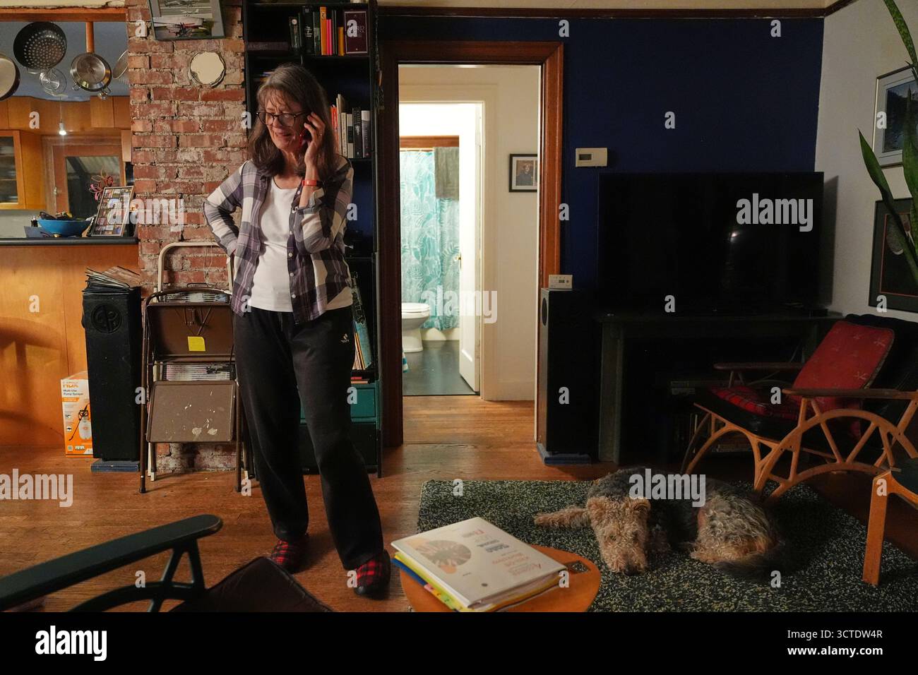 Mary E. Brunkow speaks on the phone during an interview after winning a ...