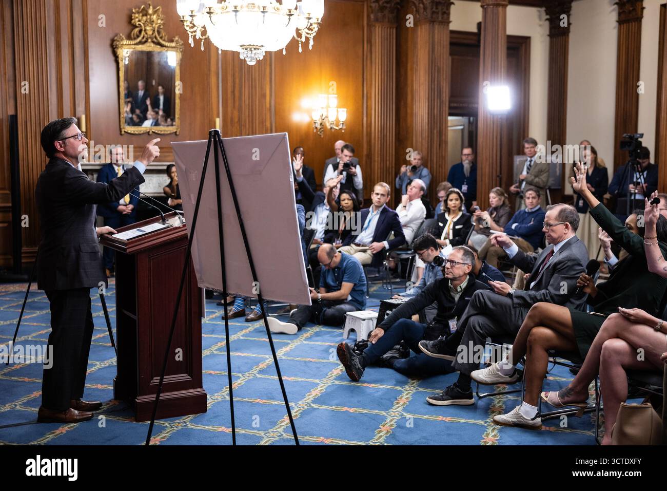 House Speaker Mike Johnson (R-La.) calls on a reporter during a press ...