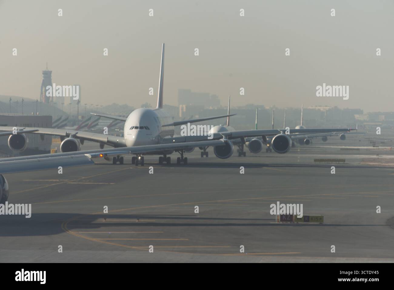 Through the passenger porthole of a Emirates 380 airbus as another ...