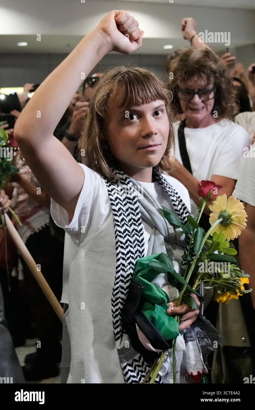 Swedish activist Greta Thunberg arrives at the Eleftherios Venizelos ...
