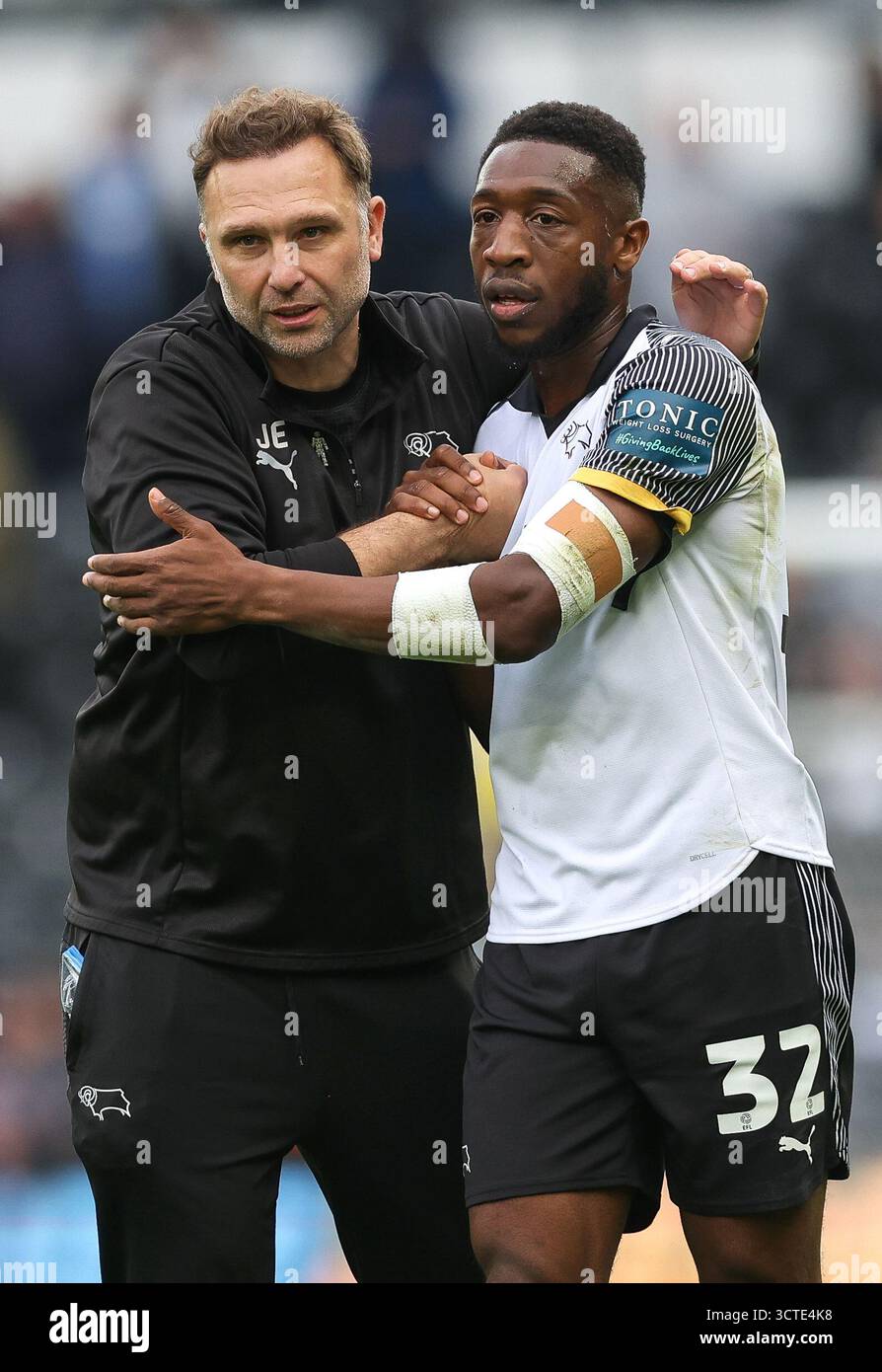 Derby County manager John Eustace with Ebou Adams after the Sky Bet ...
