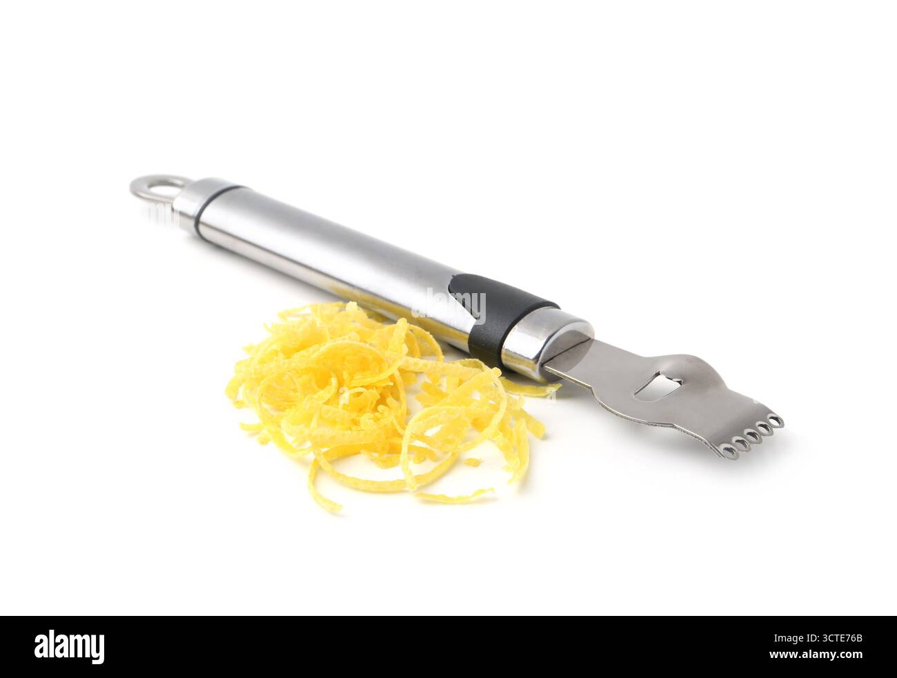 Lemon zest and zester tool isolated on white Stock Photo - Alamy
