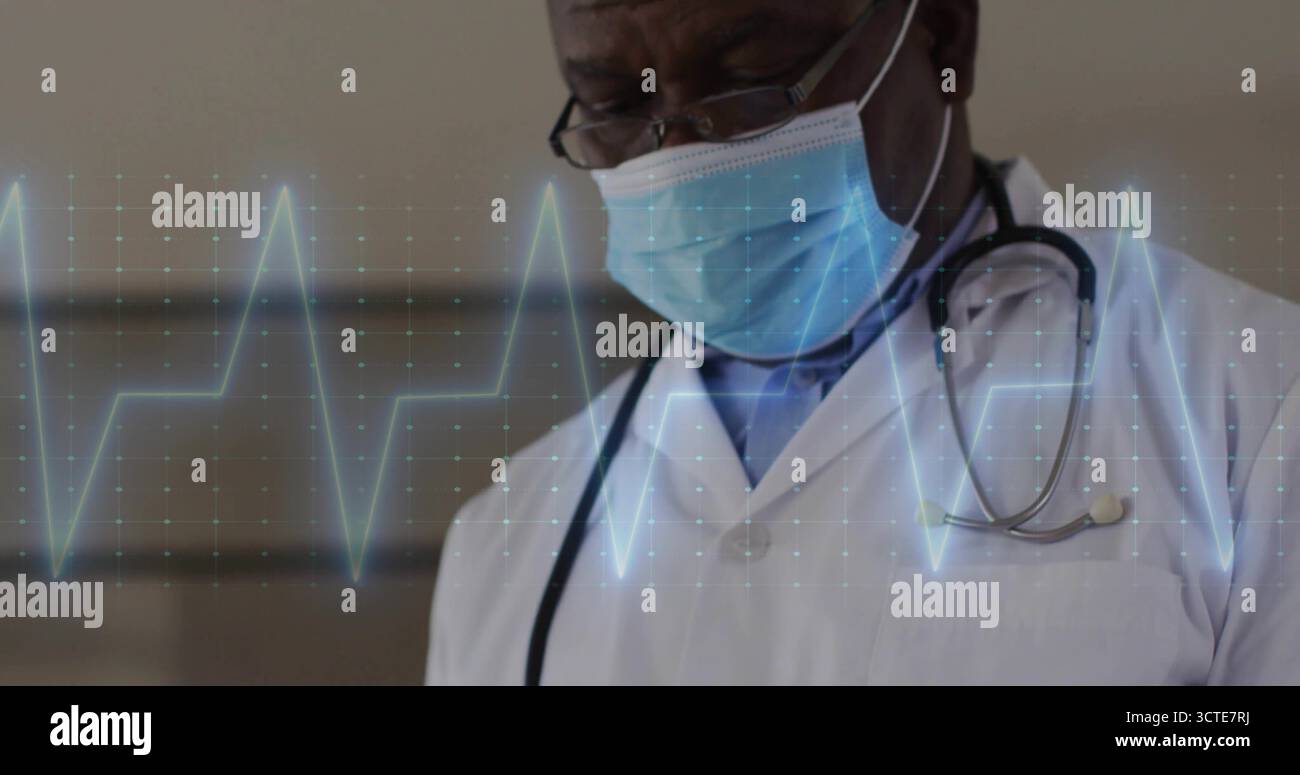 Reviewing doctor viewing ECG overlay in clinic with lab coat, mask and ...