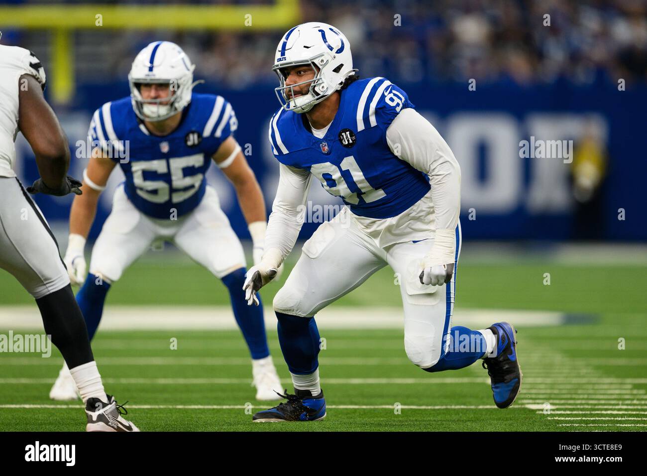Indianapolis Colts defensive end JT Tuimoloau (91) rushes around the ...