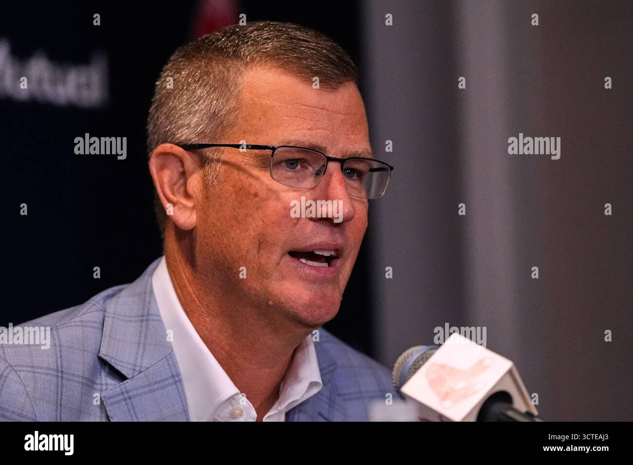 Boston Red Sox President & CEO Sam Kennedy answers a reporter's ...