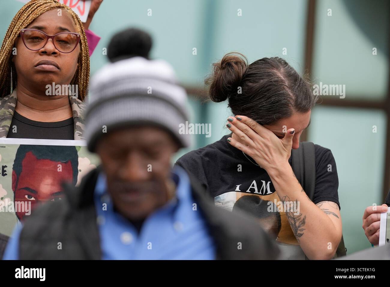 People gather for a rally for Cornelius Taylor at the Atlanta City Hall ...
