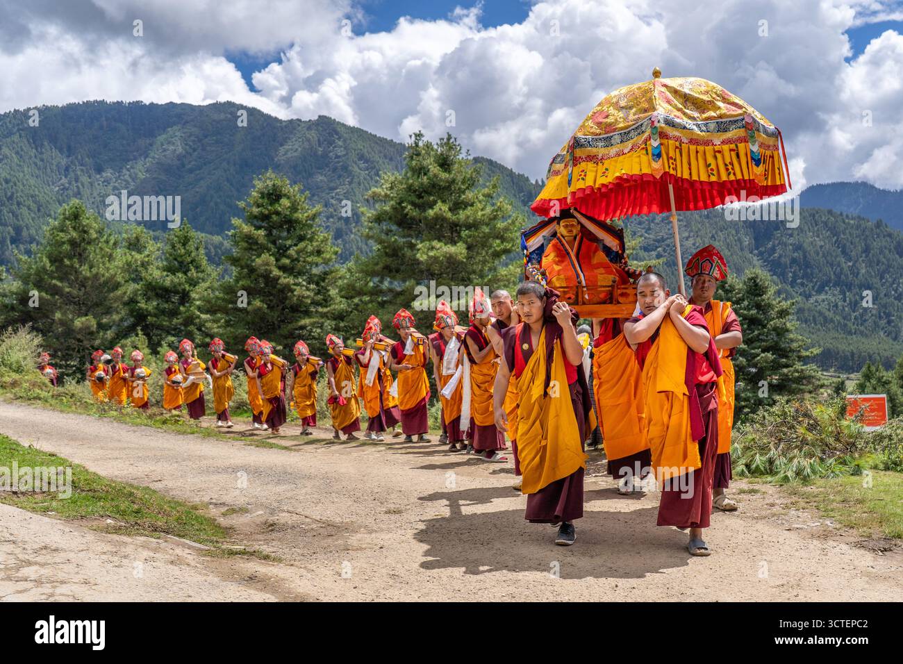 Phobjikha, Bhutan - 21 September 2025: View of monks processing along a ...