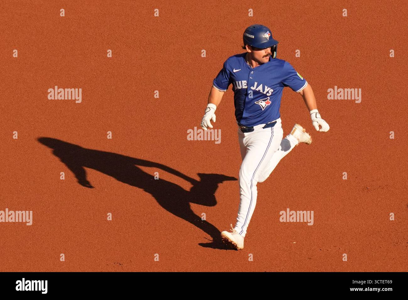 Toronto Blue Jays' Davis Schneider (36) advances to second base during ...