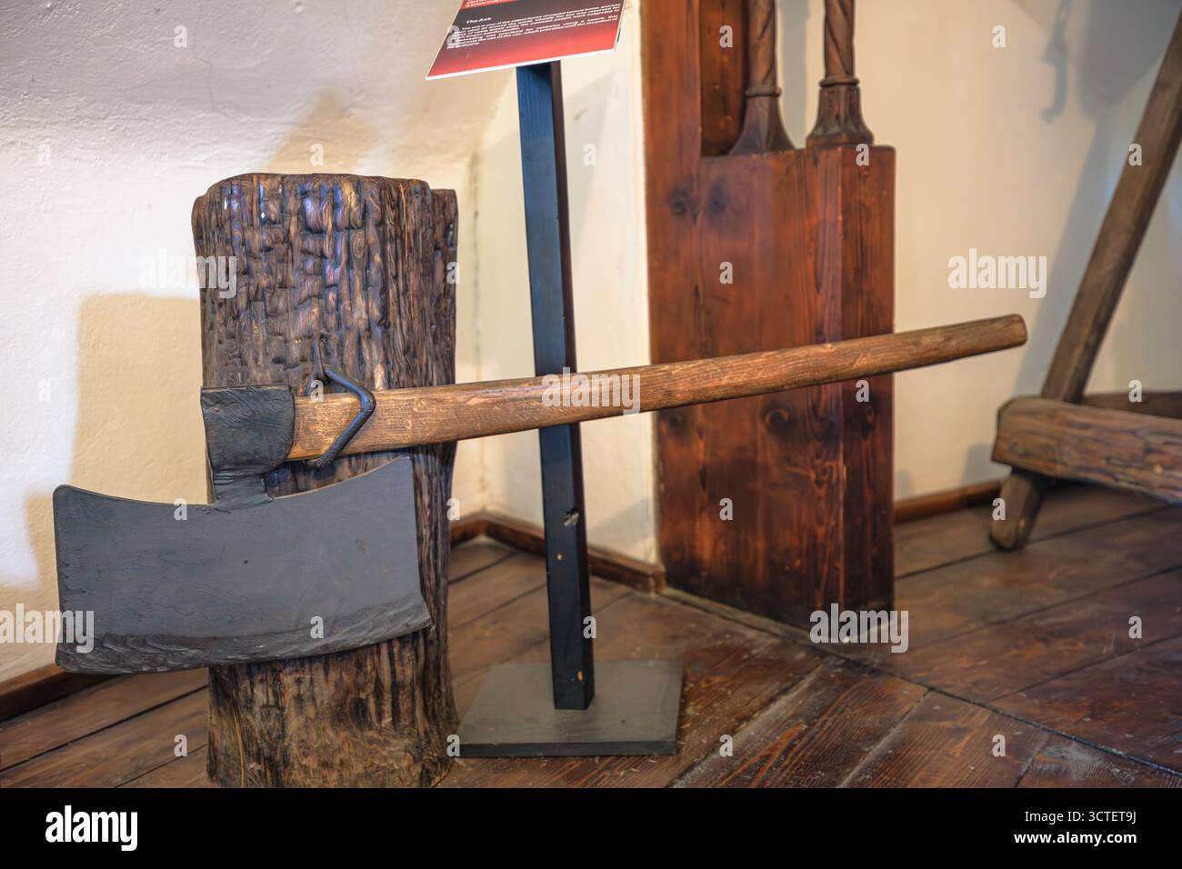 Transylvania, Romania, Aug 12, 2025: Axe and wooden stock, used for ...
