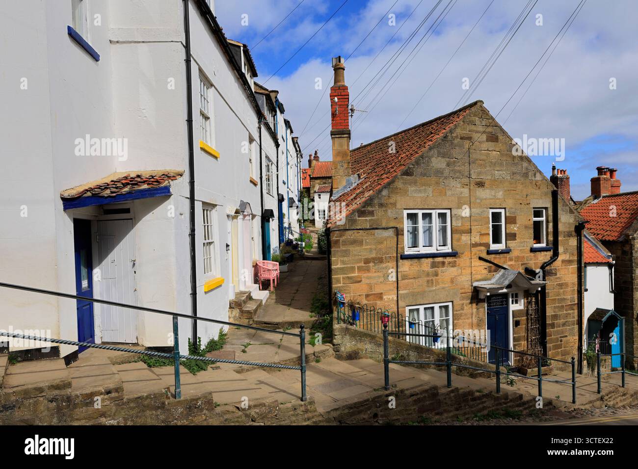 Street view in Robin Hoods Bay village, North Yorkshire coast, England ...