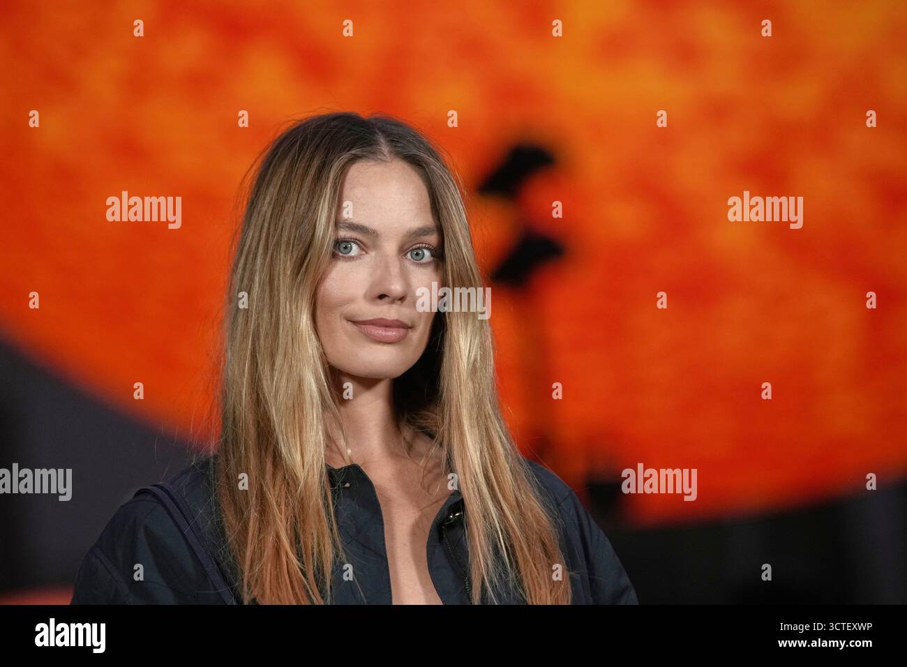 Margot Robbie poses for photographers upon arrival at the Chanel Spring ...