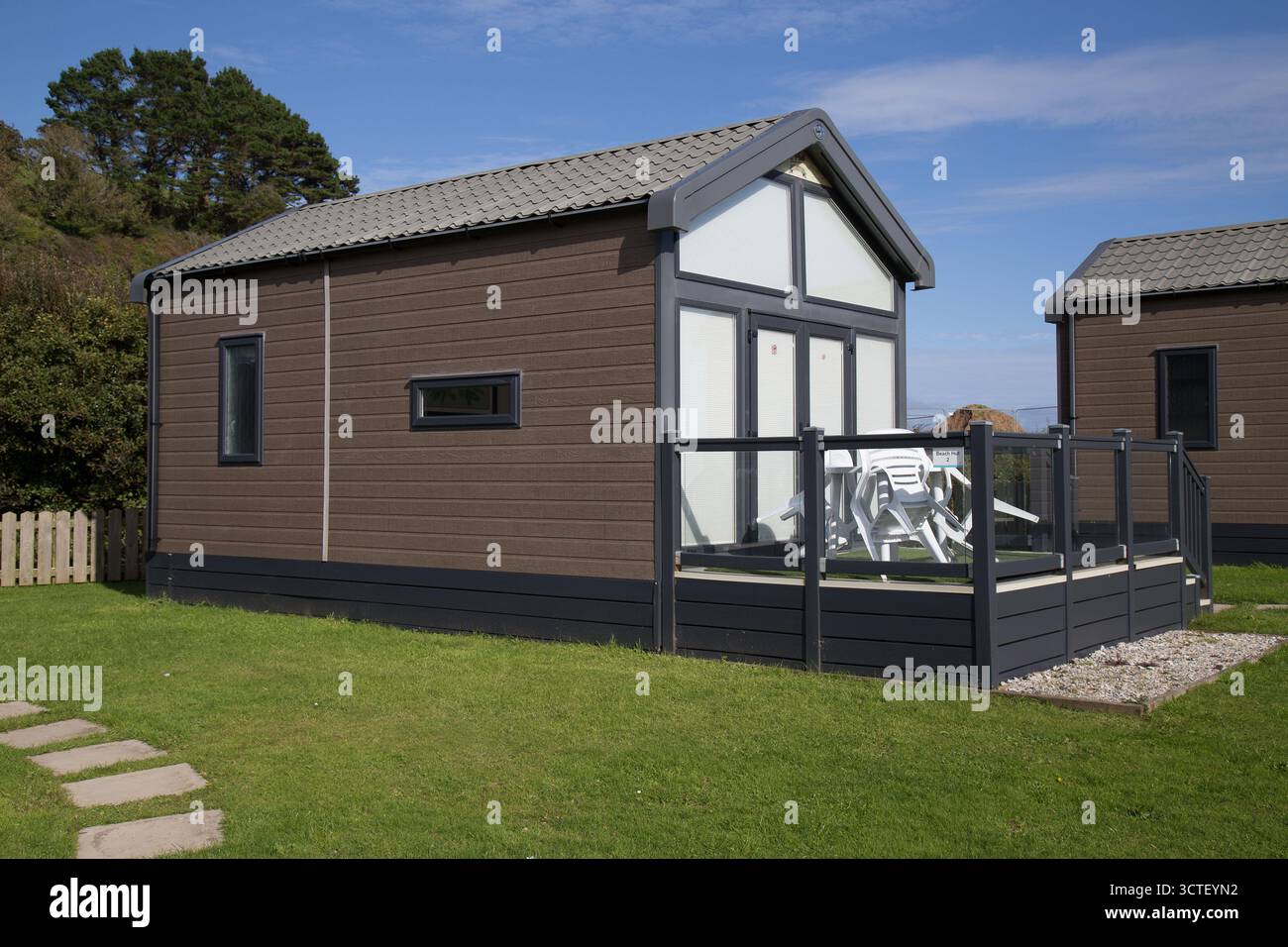 Pentewan large beach huts Stock Photo - Alamy
