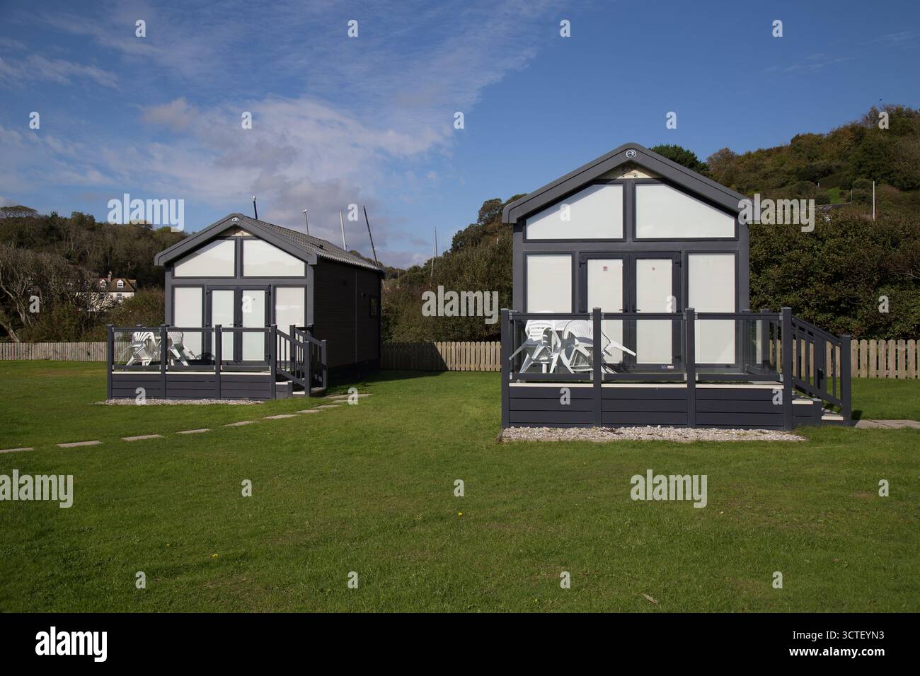 Pentewan large beach huts Stock Photo - Alamy