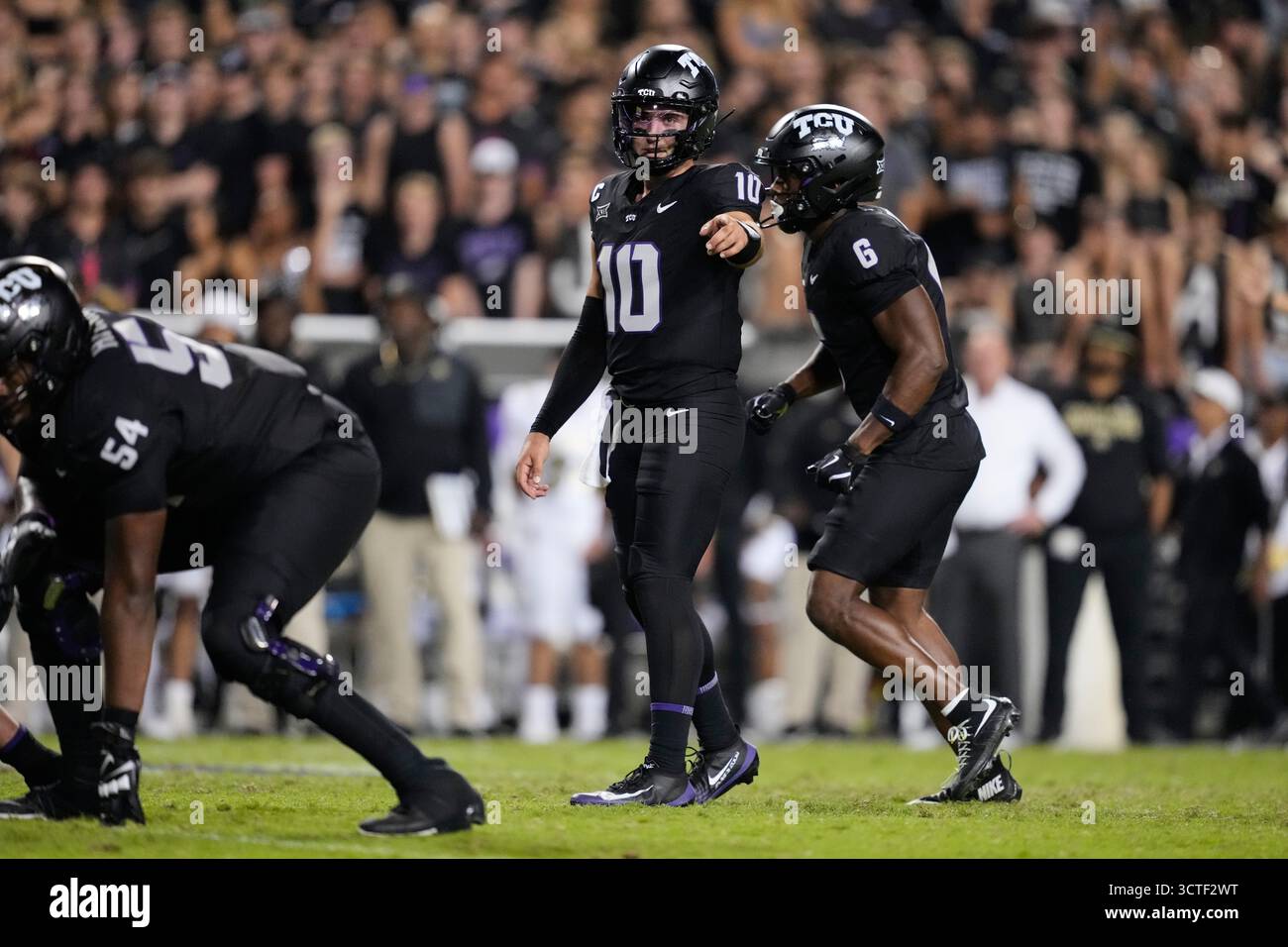 TCU quarterback Josh Hoover (10) signals at the line of scrimmage as ...