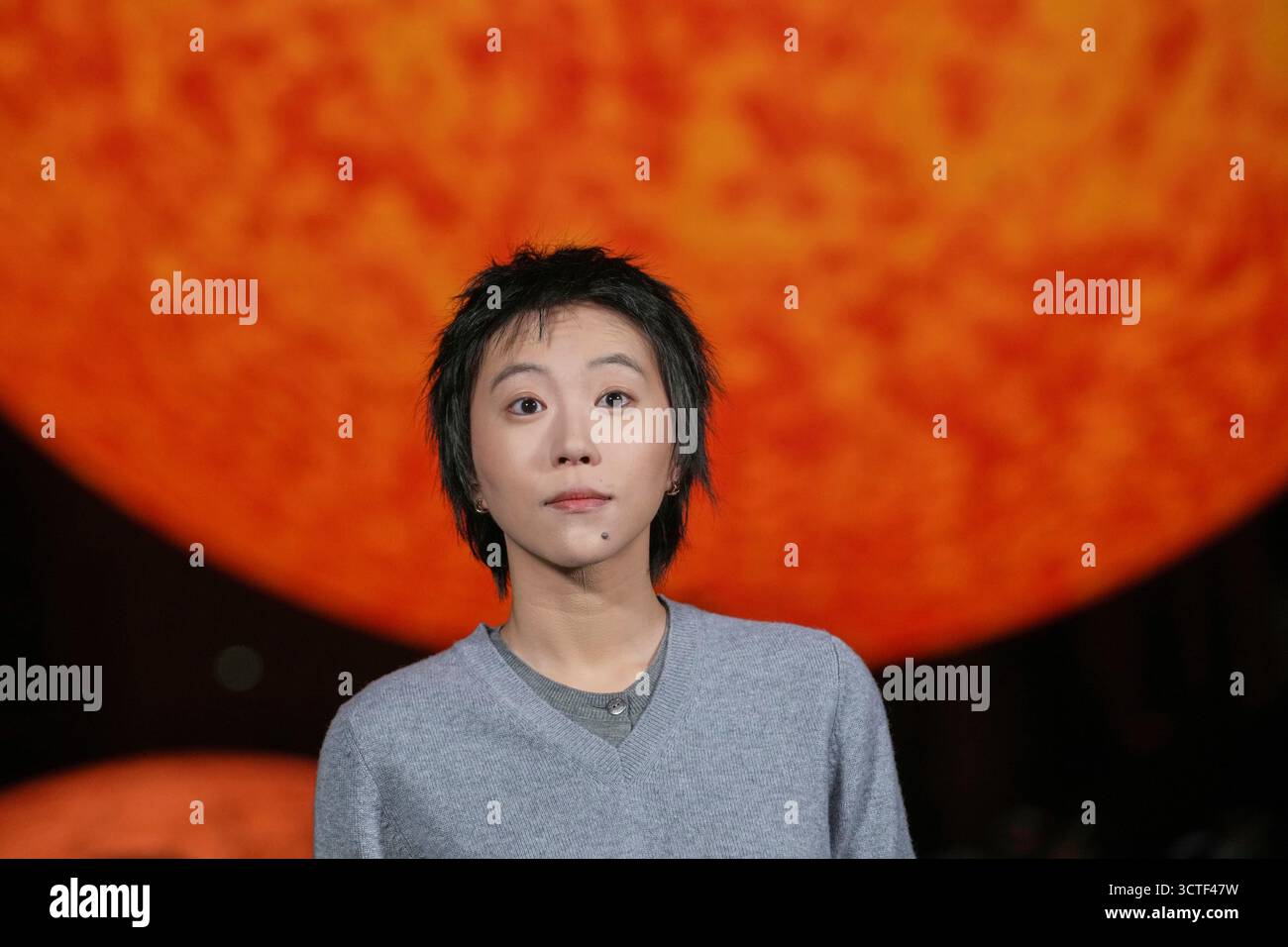 Leah Dou poses for photographers upon arrival at the Chanel Spring/Summer 2026 collection ...