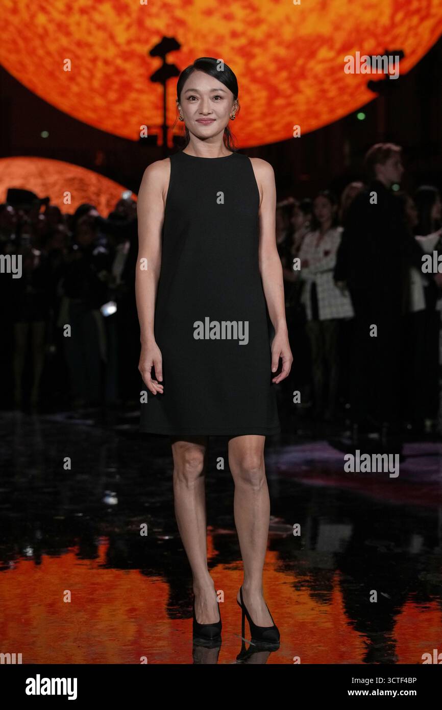 Zhou Xun poses for photographers upon arrival at the Chanel Spring ...