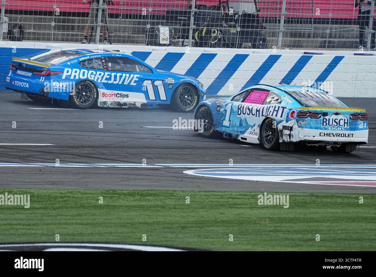 Denny Hamlin (11) and Ross Chastain (1) come to a stop on the front ...