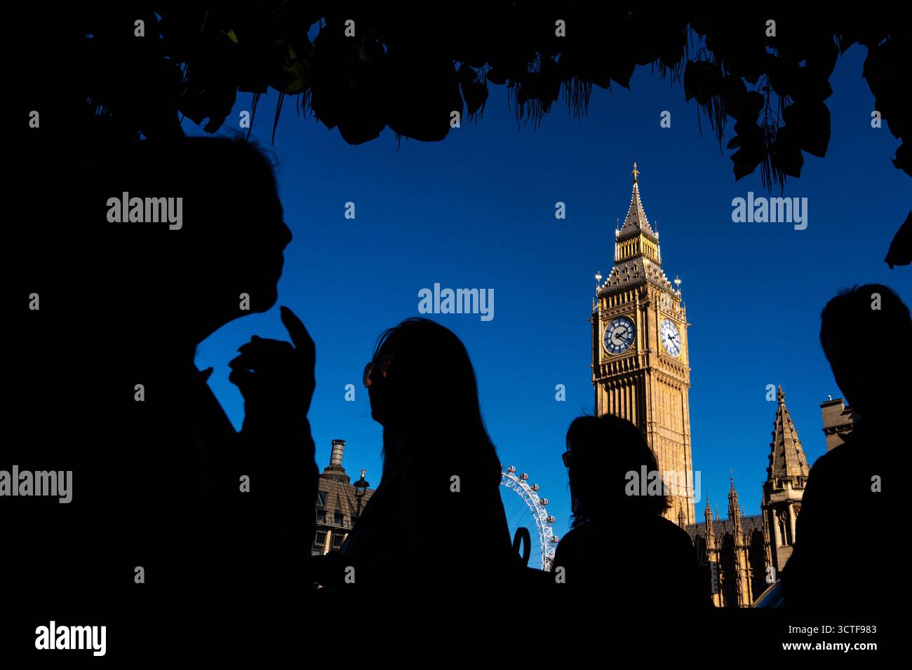 People walk past Big Ben, Monday, Oct. 6, 2025, in London. (AP Photo ...