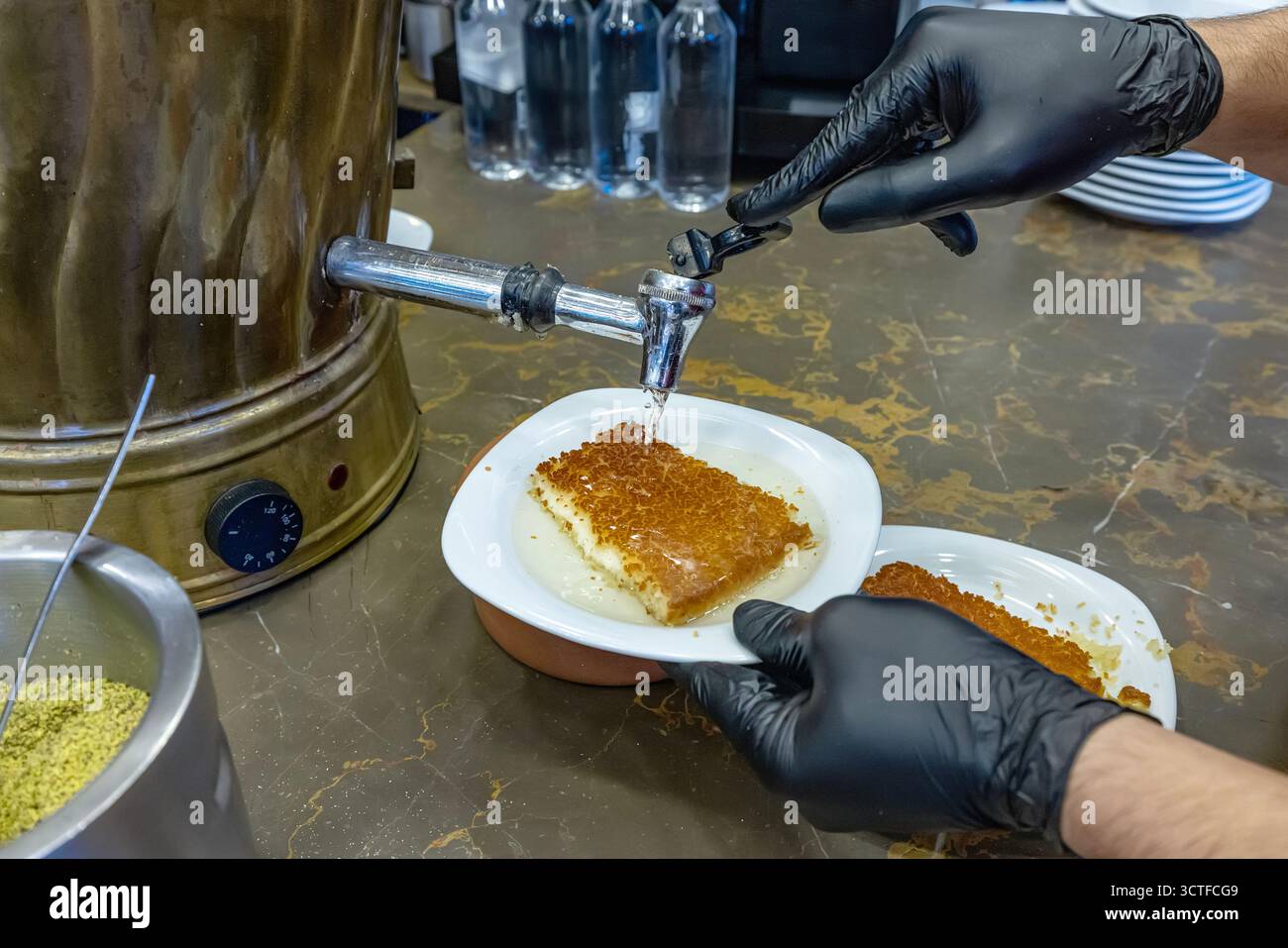 Homemade traditional sweets Kunafa with Nuts and honey syrup, konafa ...