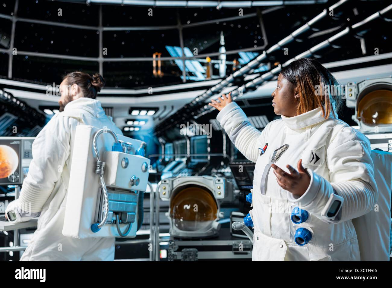 Astronaut troubleshooting spacecraft hardware hi-res stock photography ...