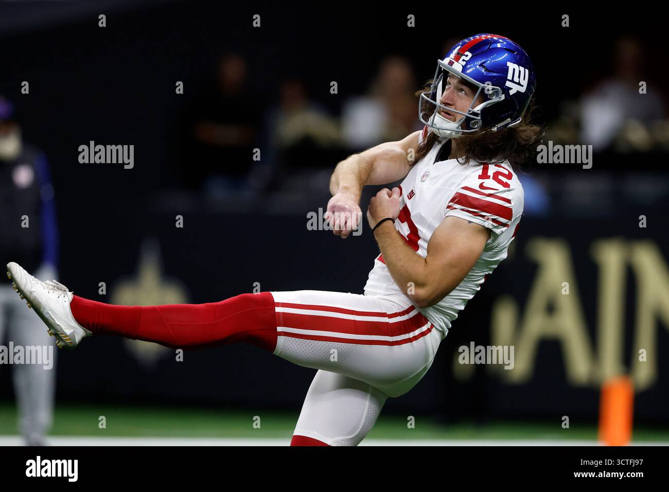 New York Giants punter Jamie Gillan warms up before an NFL football ...