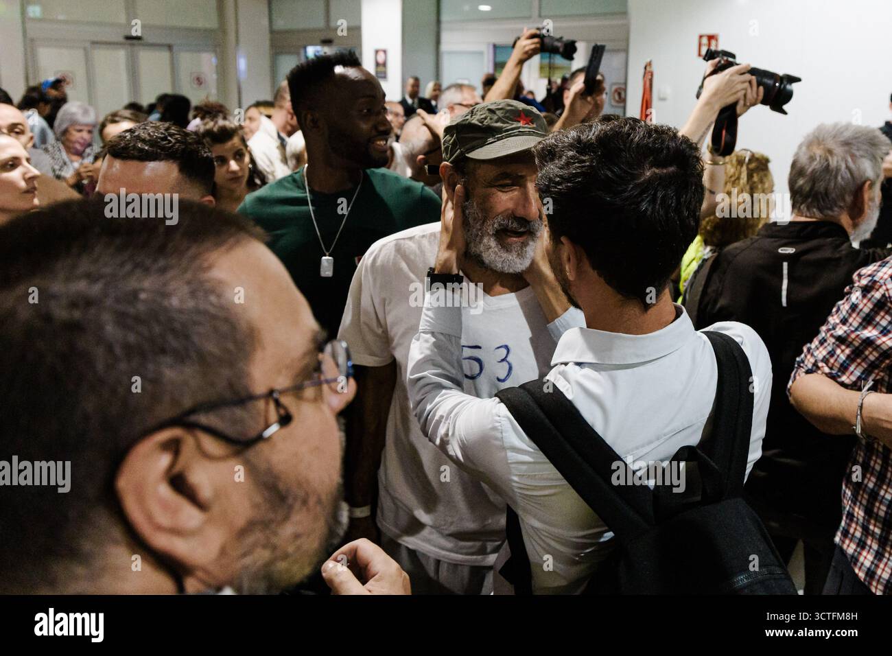 Activists arriving at Adolfo Suarez Madrid-Barajas Airport, October 6 ...