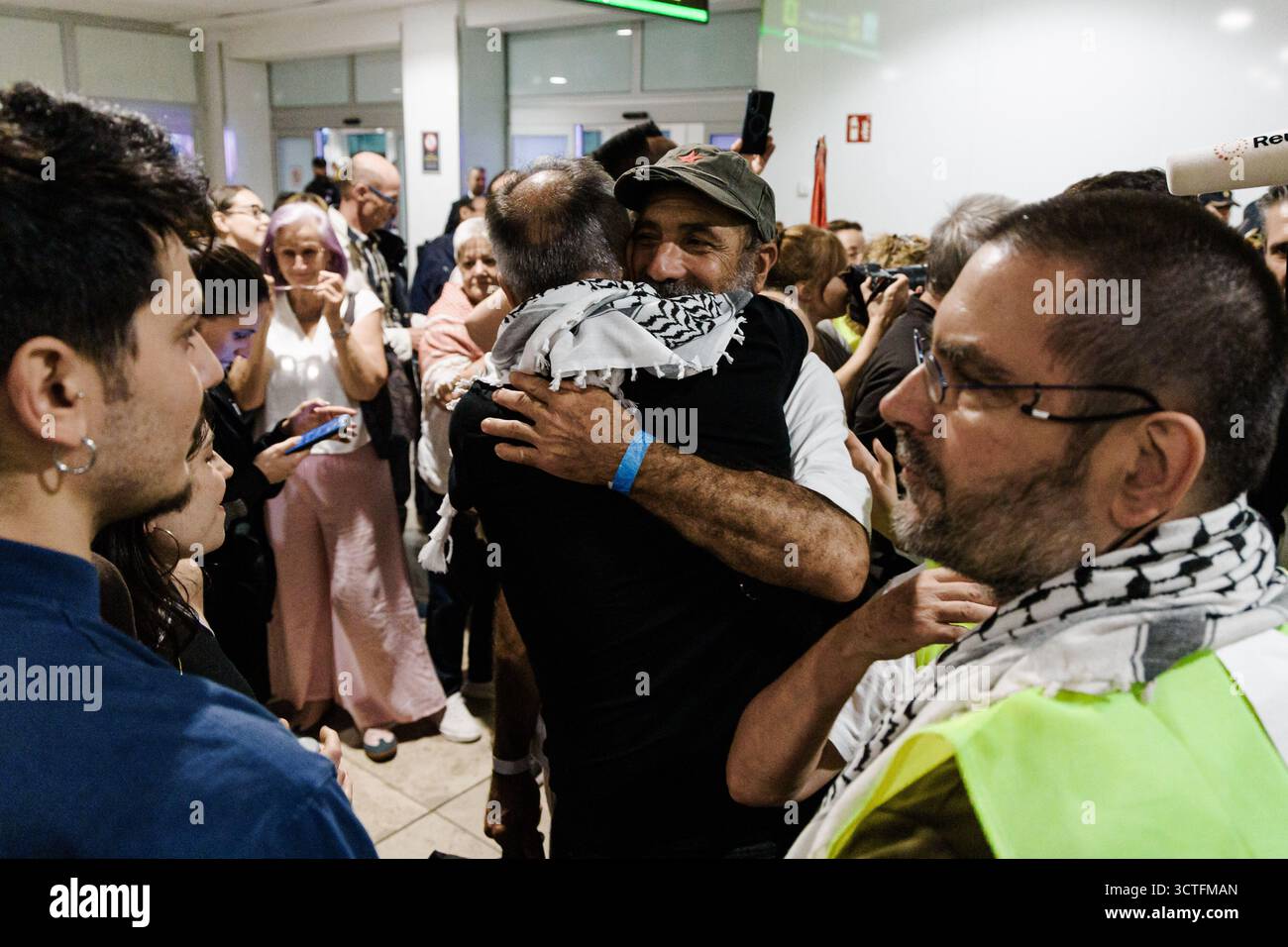 Activists arriving at Adolfo Suarez Madrid-Barajas Airport, October 6 ...