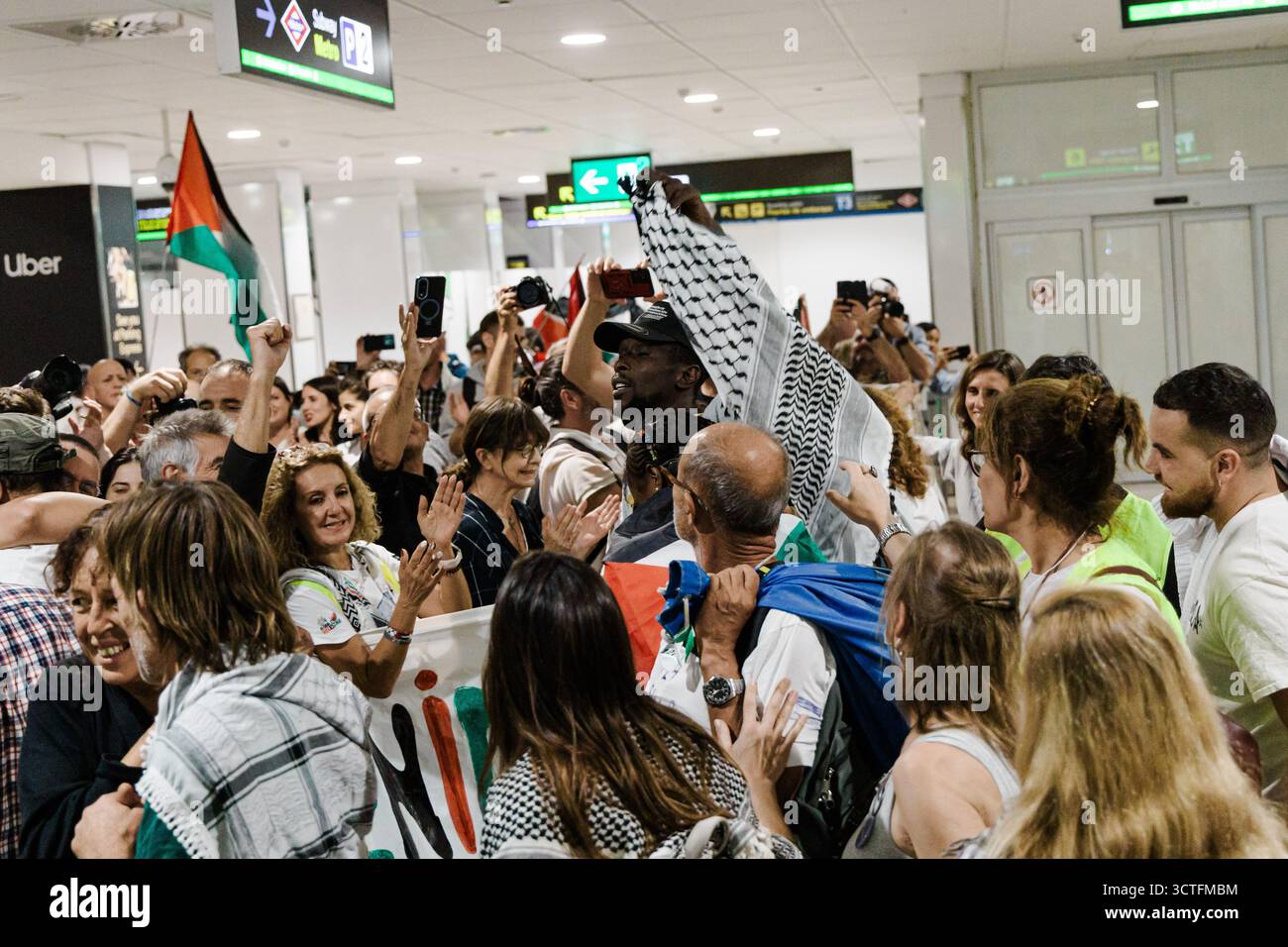 Activists arriving at Adolfo Suarez Madrid-Barajas Airport, October 6 ...