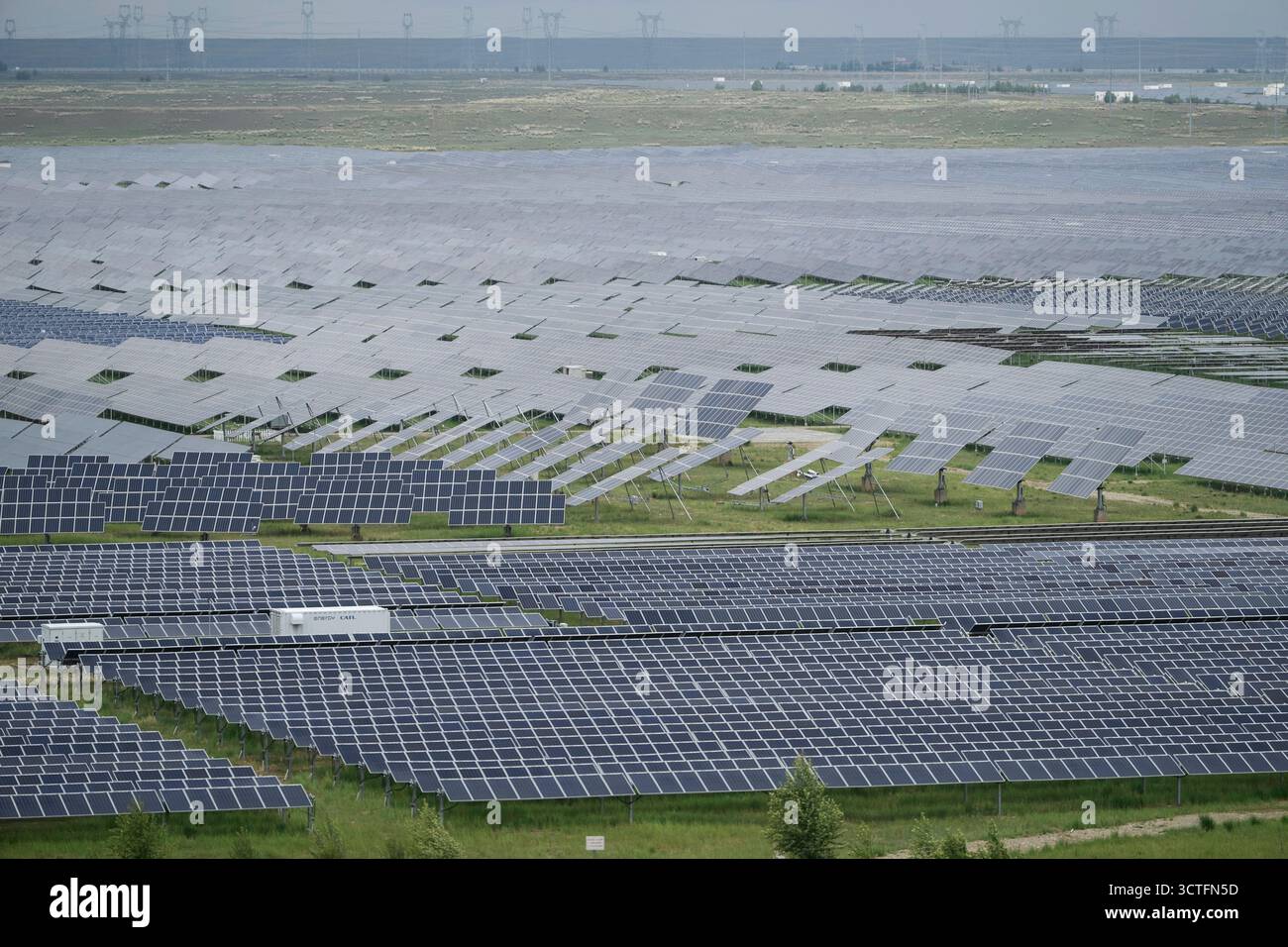 FILE - A solar farm is visible in Hainan prefecture of western China's ...