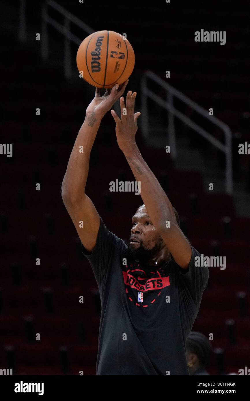 Houston Rockets forward Kevin Durant warms up before an NBA basketball ...