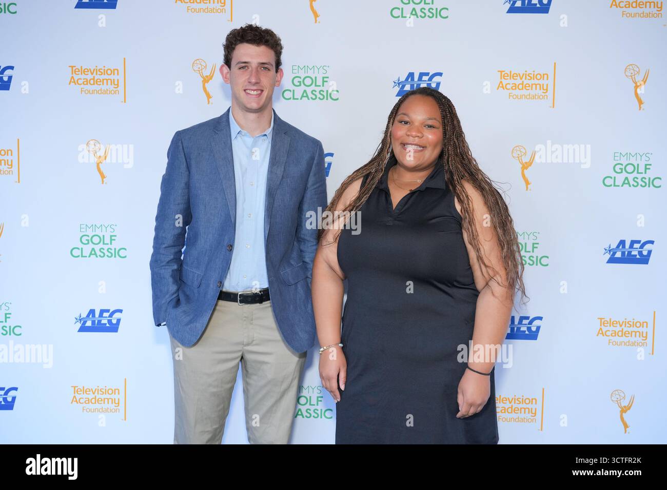 Simon Blaustein, left, and Paris Carrington attend the 25th Emmys Golf ...
