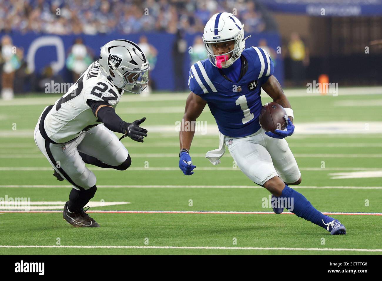 Indianapolis Colts wide receiver Josh Downs (1) tries to avoid the ...