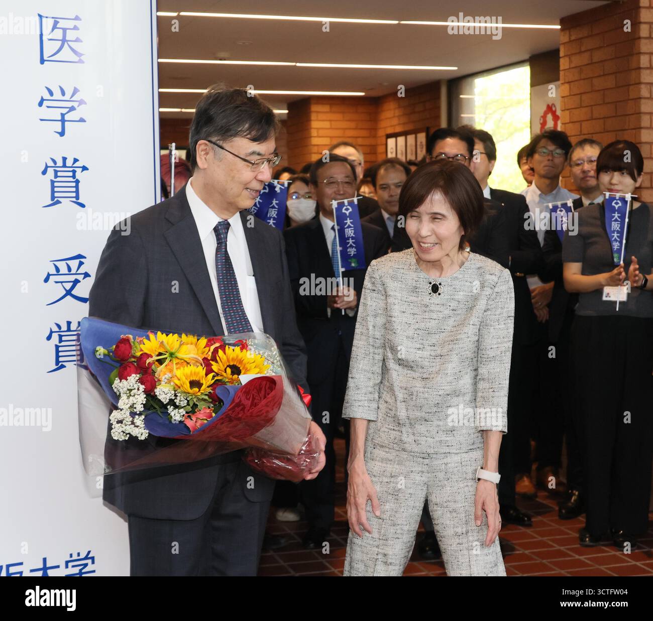 Shimon SAKAGUCHI, a specially appointed professor at the University of Osaka (L), pose for ...