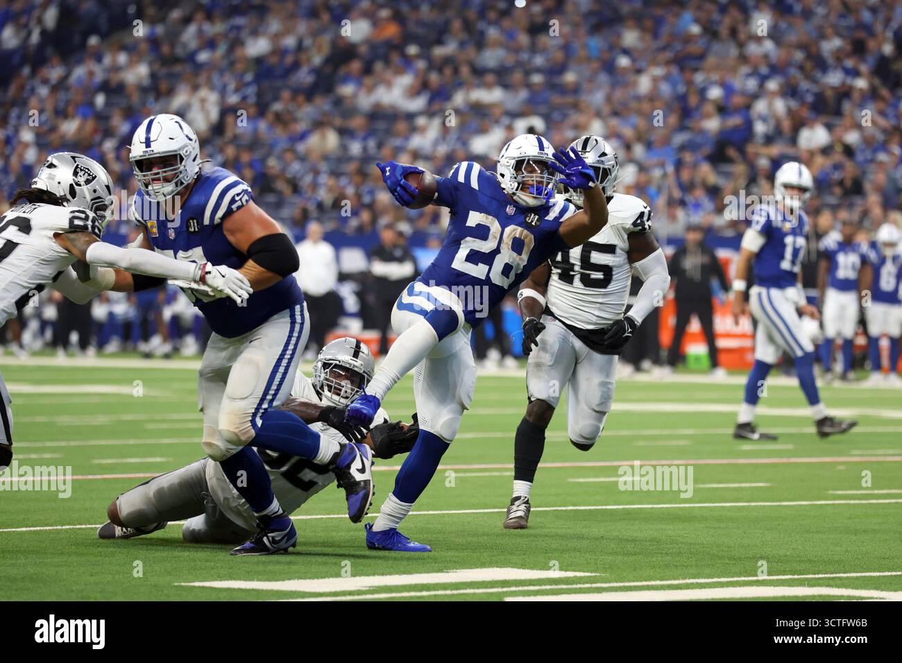 Indianapolis Colts running back Jonathan Taylor (28) runs with the ball ...