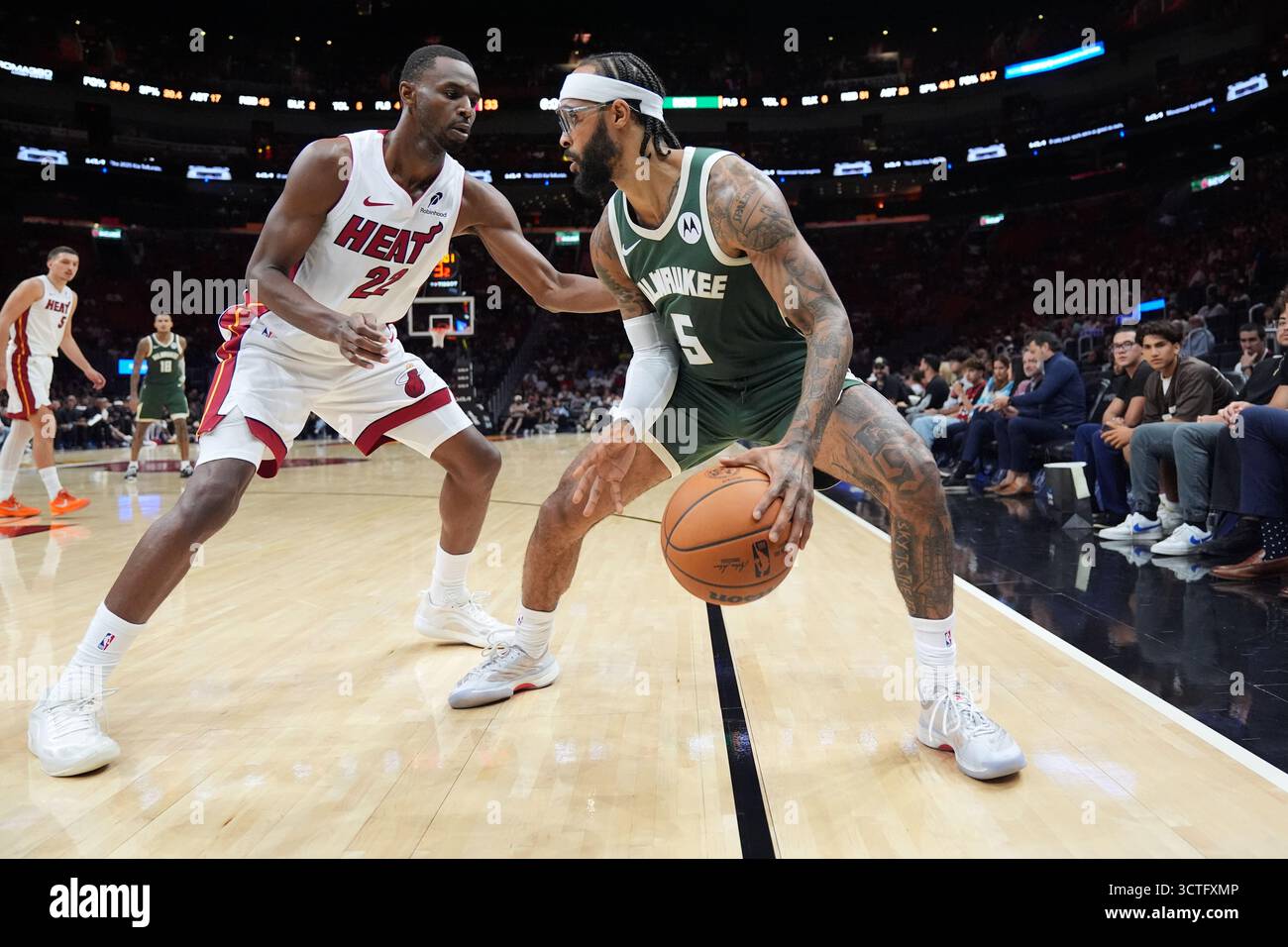 Milwaukee Bucks guard Gary Trent Jr. (5) comes under pressure from ...