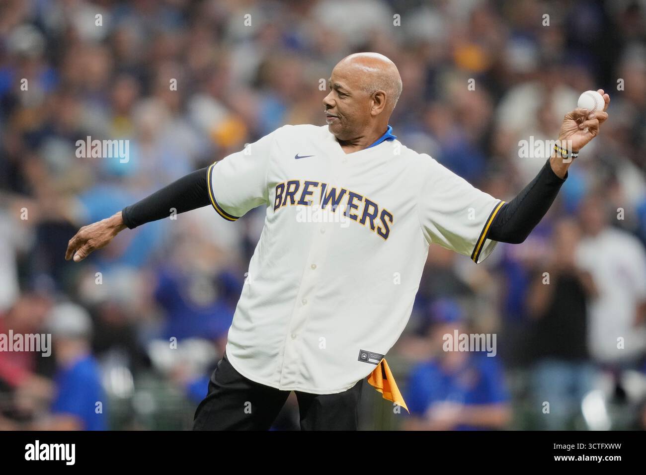 Former Milwaukee Brewers player Cecil Cooper throws out a ceremonial ...