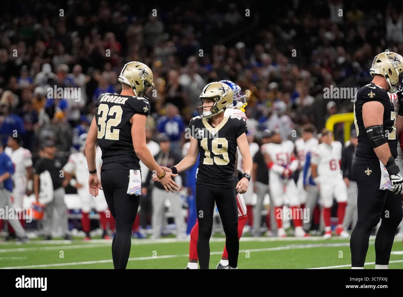 New Orleans Saints kicker Blake Grupe (19) is congratulated after a ...