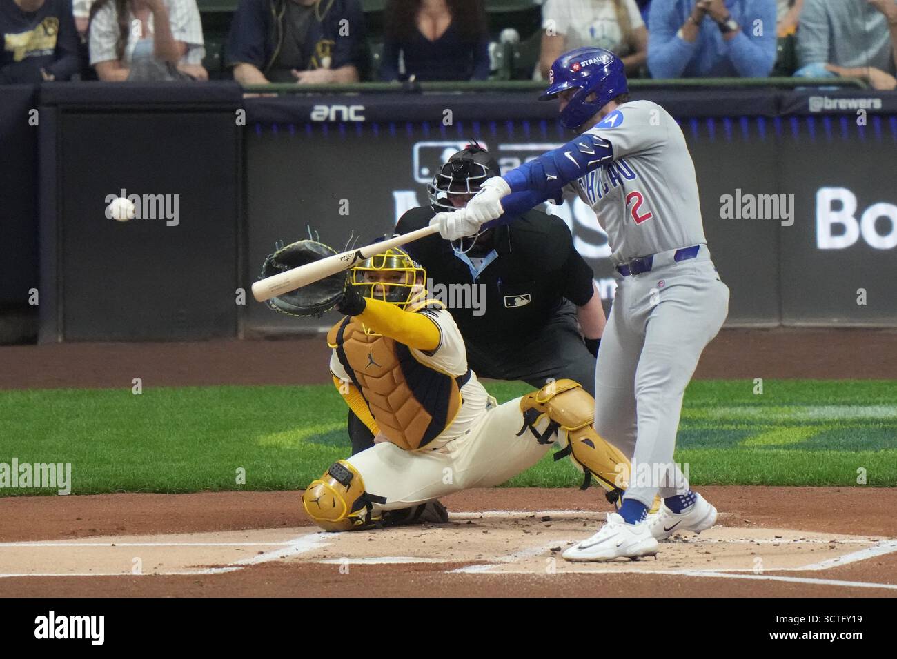 Chicago Cubs' Nico Hoerner (2) hits a single during the first inning of ...