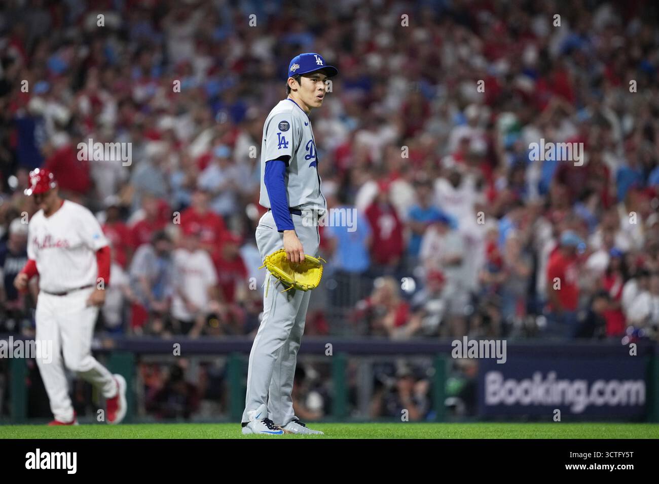 Los Angeles Dodgers relief pitcher Roki Sasaki watches as Philadelphia ...