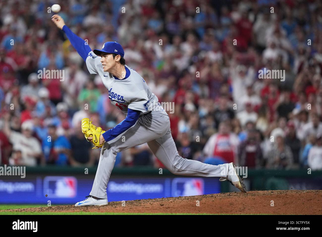 Los Angeles Dodgers relief pitcher Roki Sasaki throws during the ninth ...