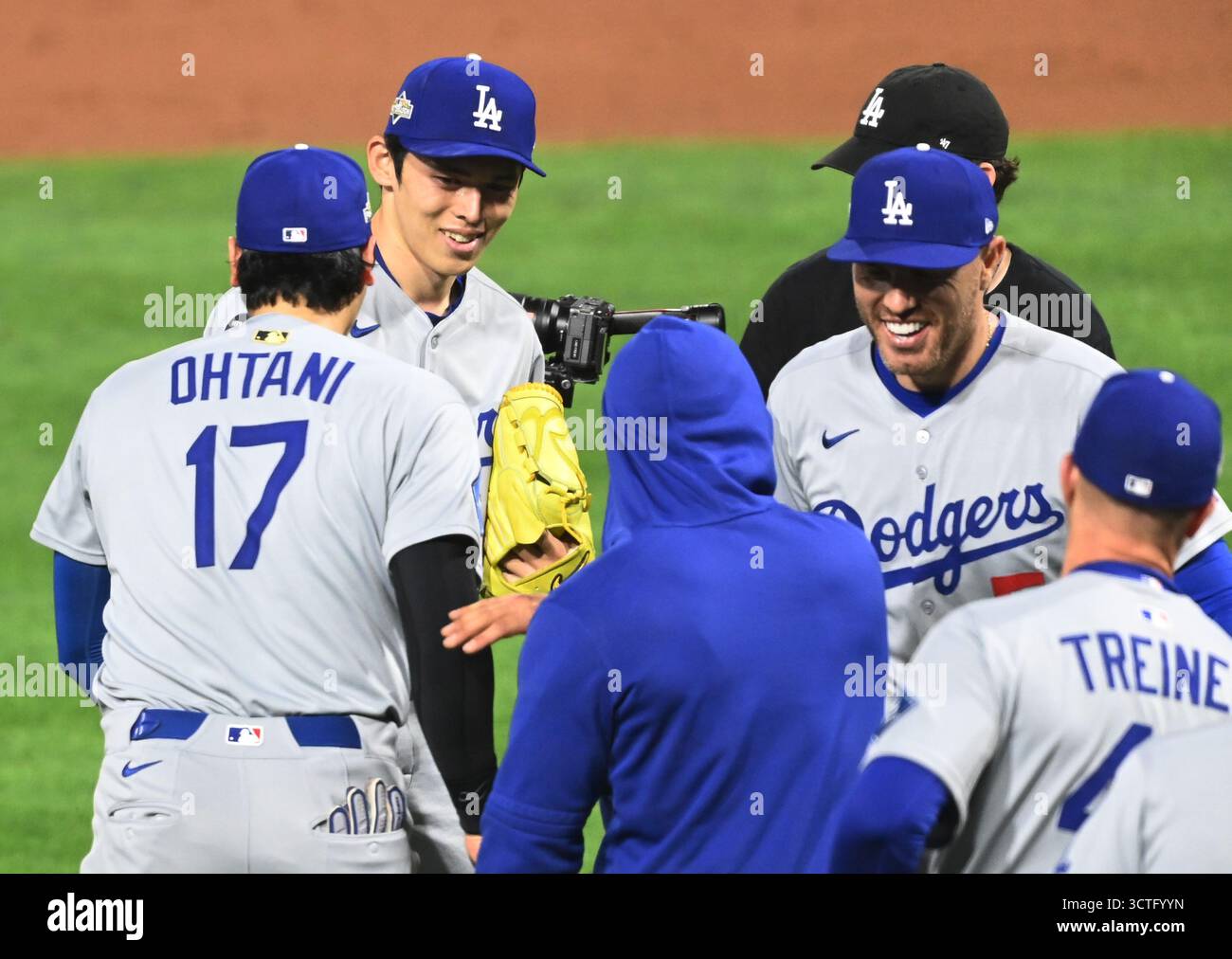 Los Angeles Dodgers pitcher Roki Sasaki and others celebrate after ...