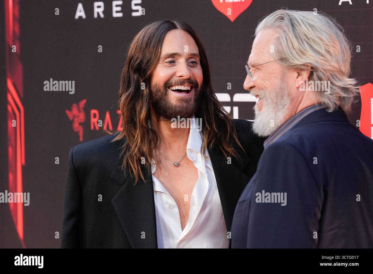 Jared Leto, left, and Jeff Bridges arrive at the premiere of "Tron ...