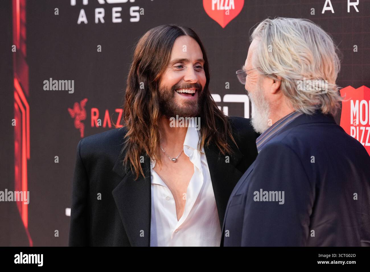 Jared Leto, left, and Jeff Bridges arrive at the premiere of "Tron ...