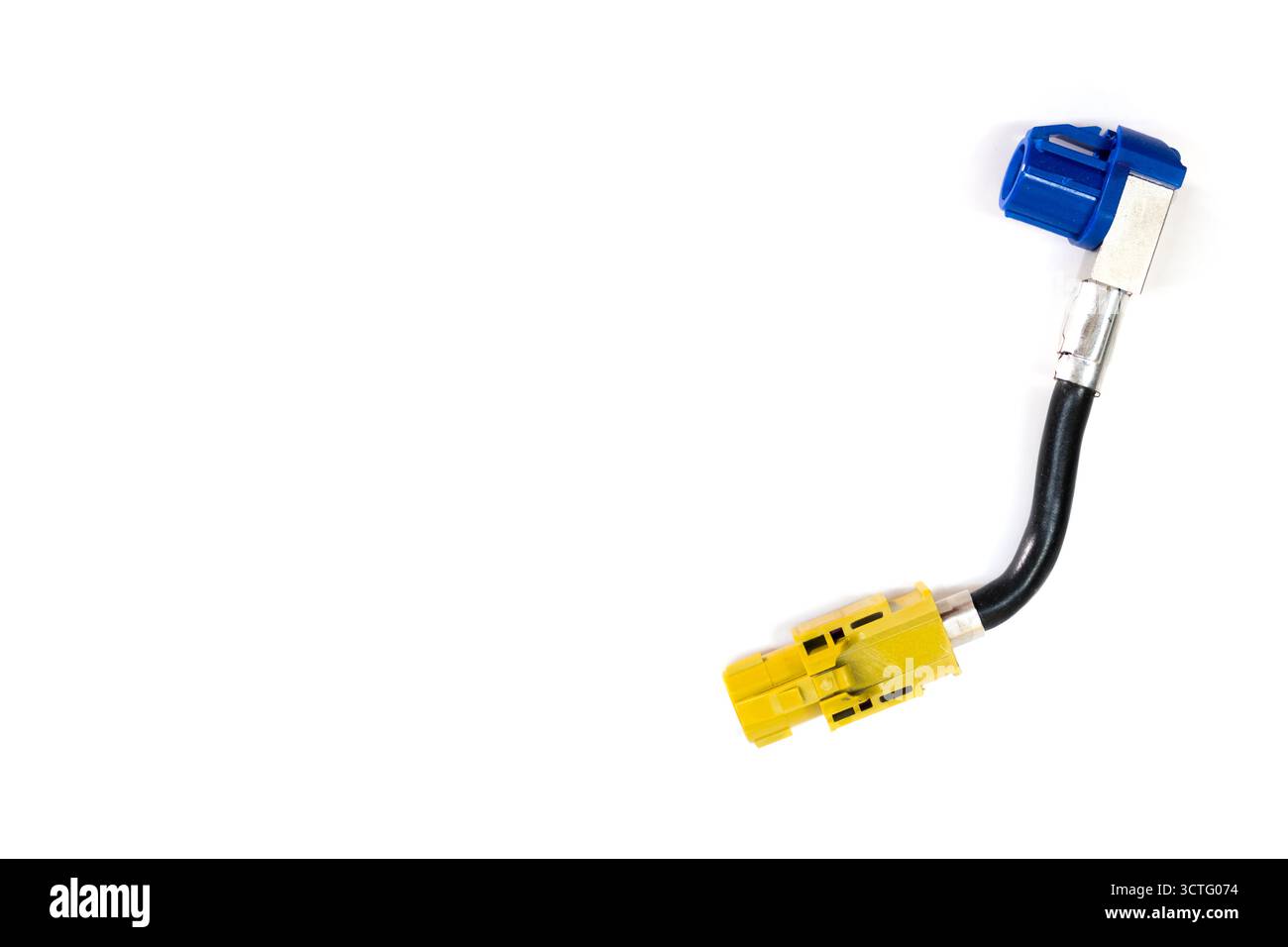 Close up view of yellow and blue automotive electronic connector with ...