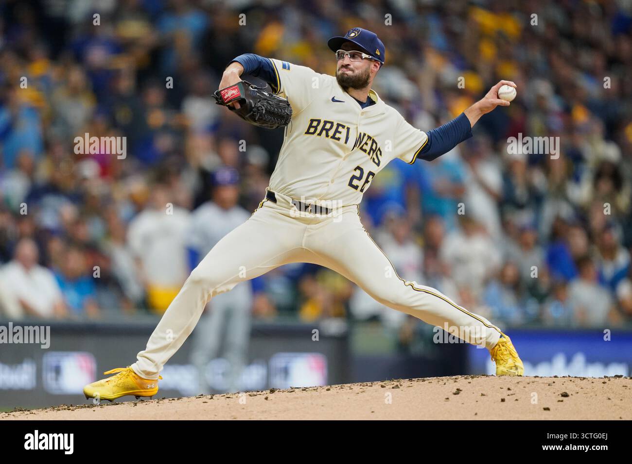 Milwaukee Brewers starting pitcher Aaron Ashby (26) delivers during the ...