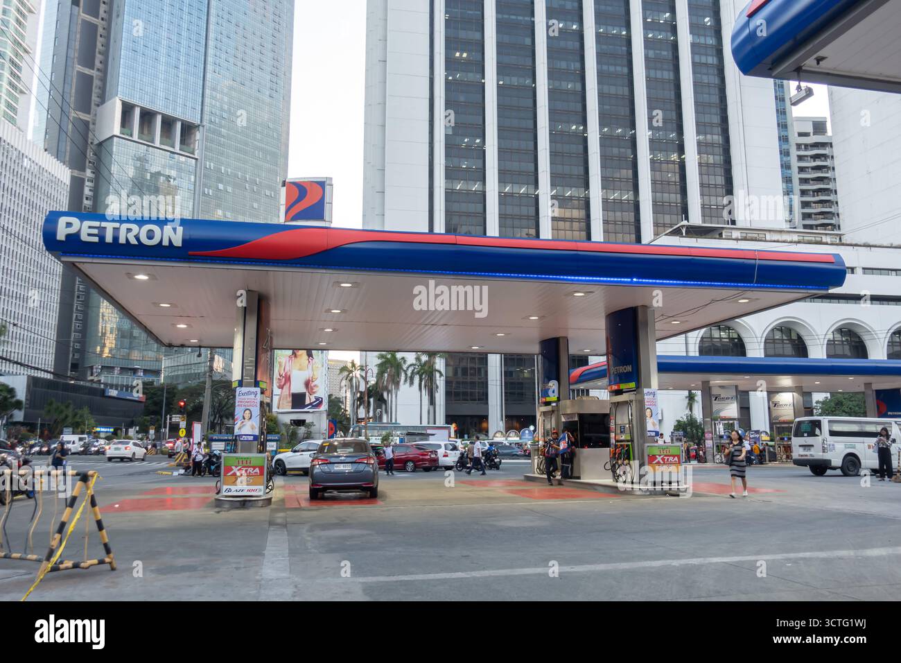 Petron gas station in Manila. Petron Corporation is the largest oil ...