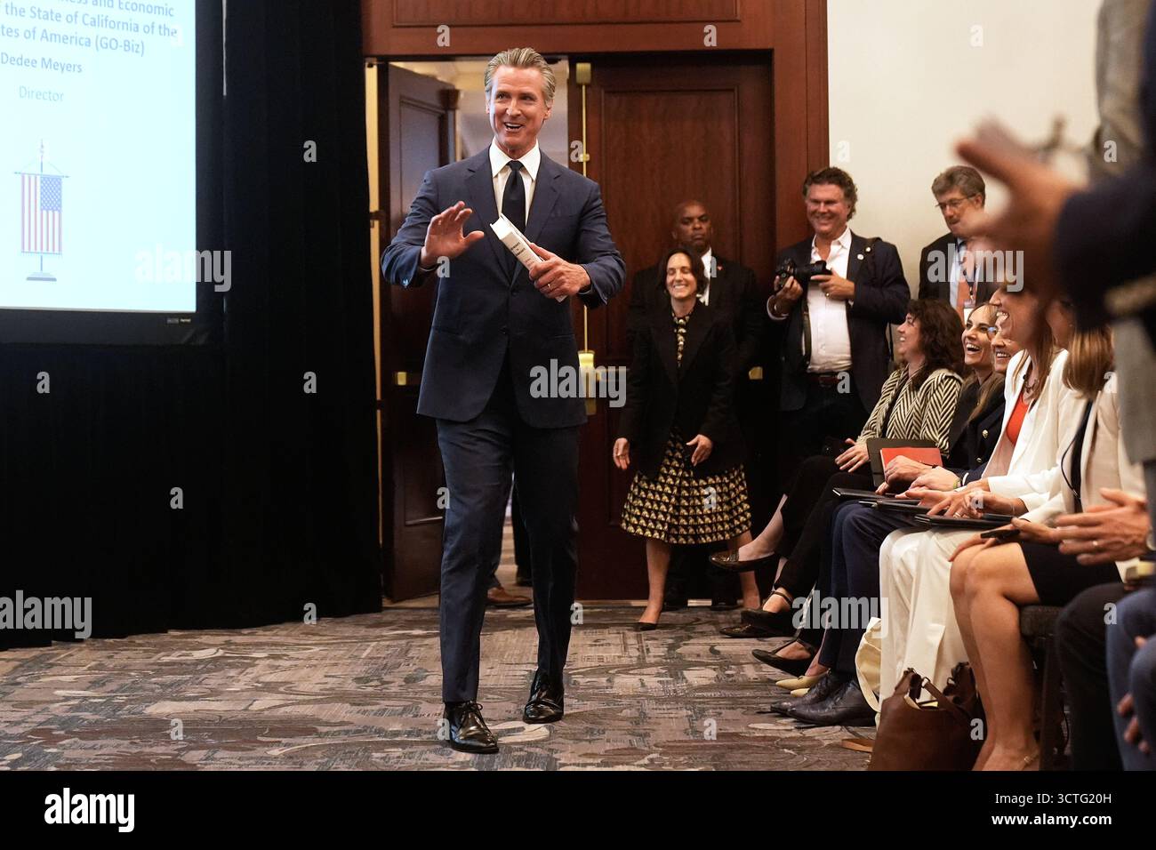 California Gov. Gavin Newsom gestures during the official signing ceremony of the Belgian ...