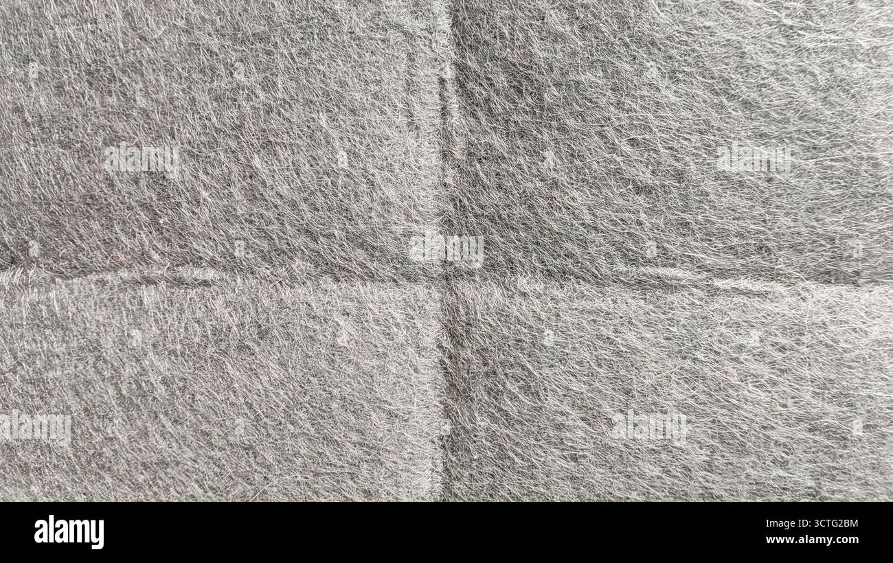 Wrinkled and Textured Gray Non-Woven Fabric Close-Up with Soft Fuzz ...