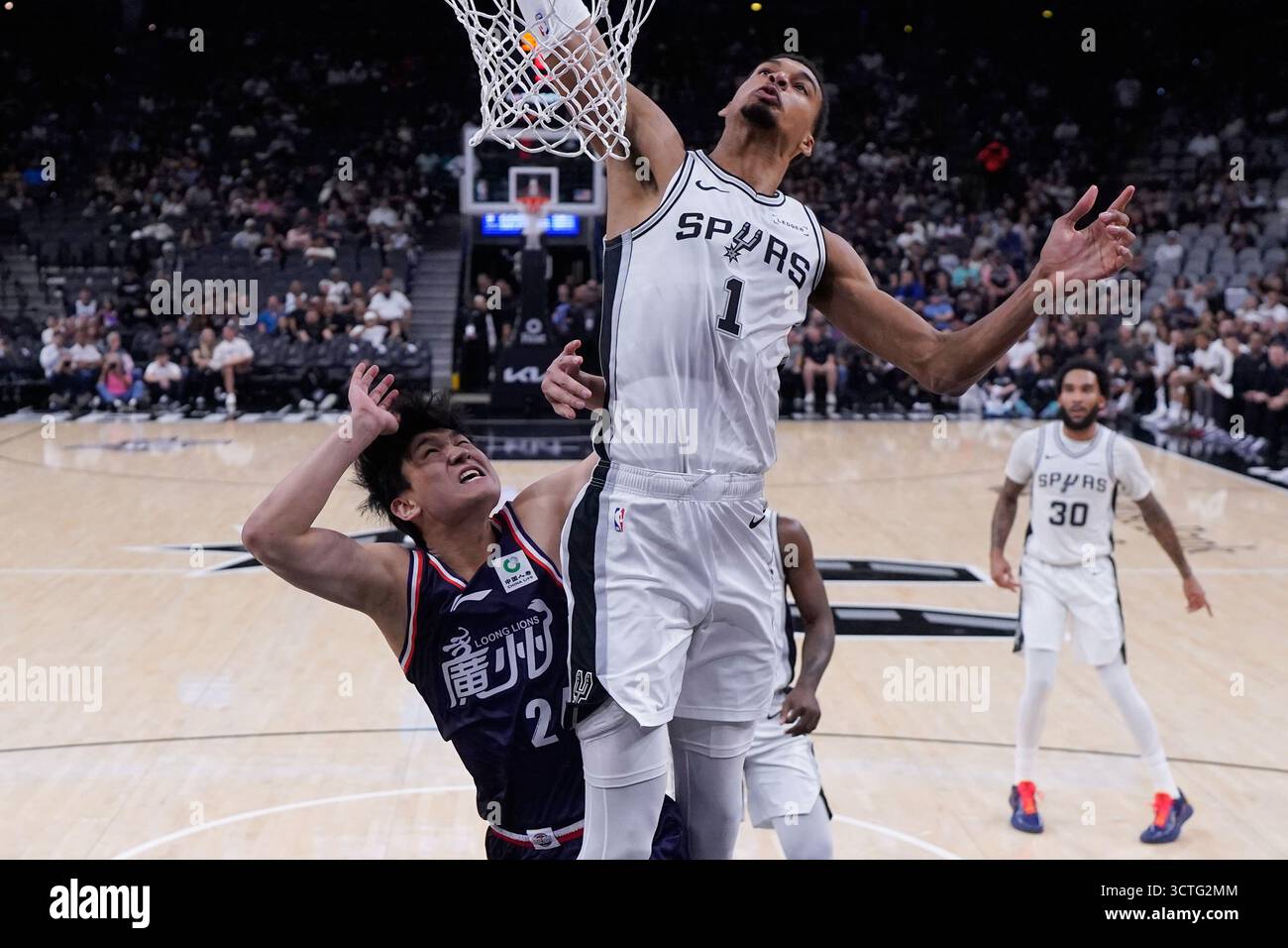 San Antonio Spurs forward/center Victor Wembanyama (1) blocks Guangzhou ...