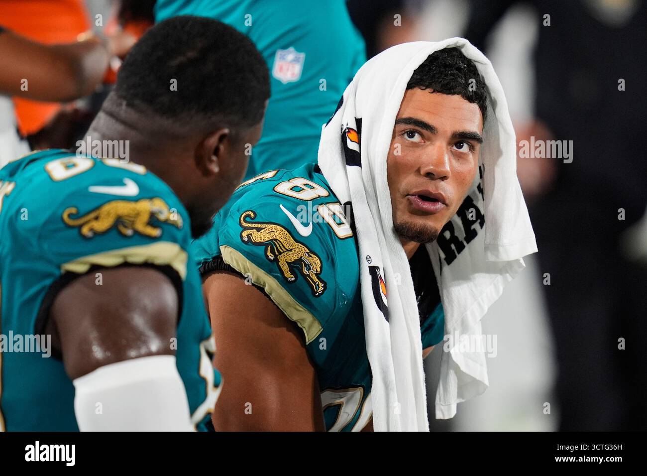 Jacksonville Jaguars tight end Brenton Strange (85) sits on the bench ...